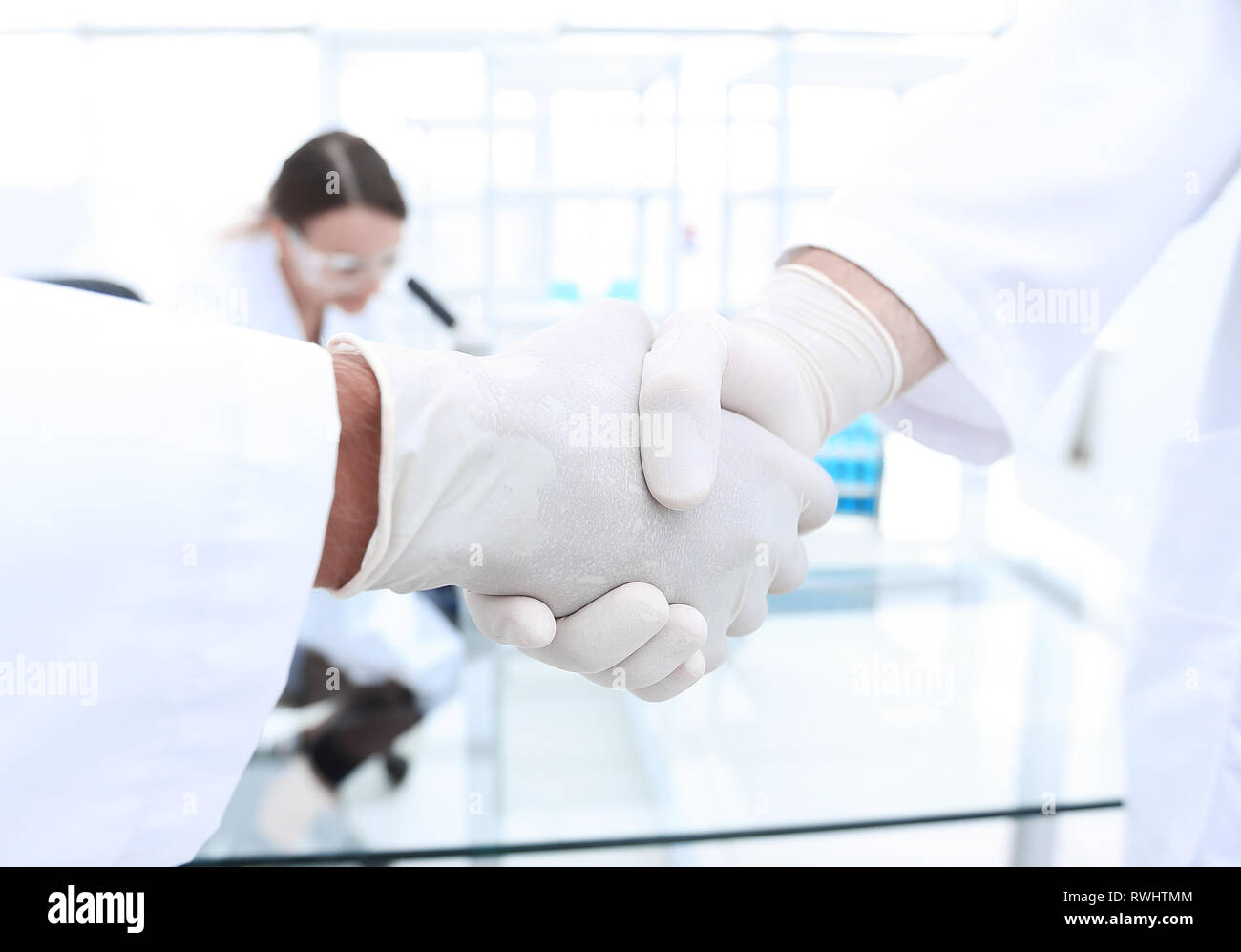 Gloved Handshake High Resolution Stock Photography and Images - Alamy