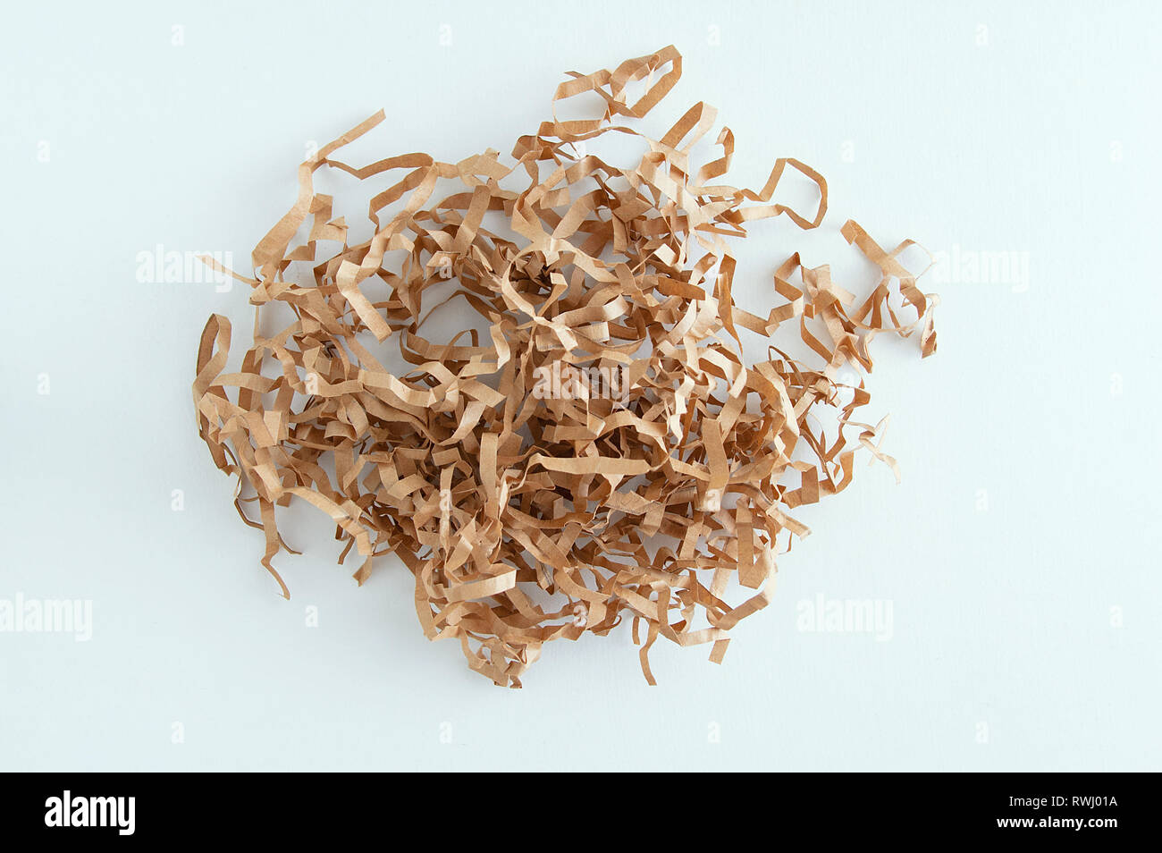 Paper brown shavings. View from above. White background Stock Photo - Alamy