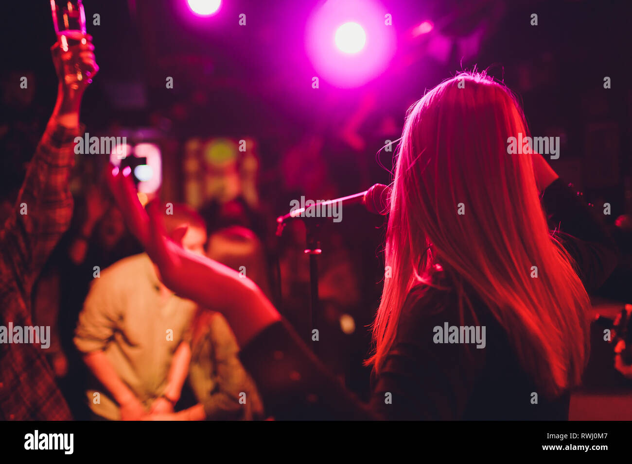 Hands up crowd bar hi-res stock photography and images - Alamy
