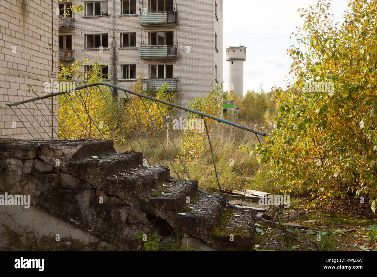 Abandoned apartment block stairway and tower at Skrunda-1, former ...