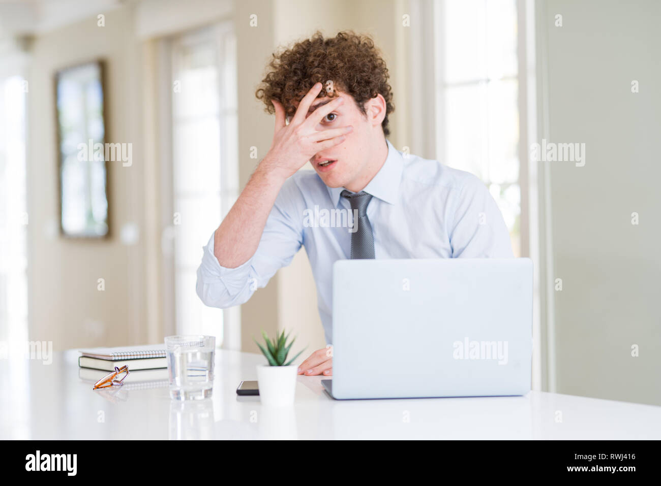 Man computer cover eyes hi-res stock photography and images - Alamy