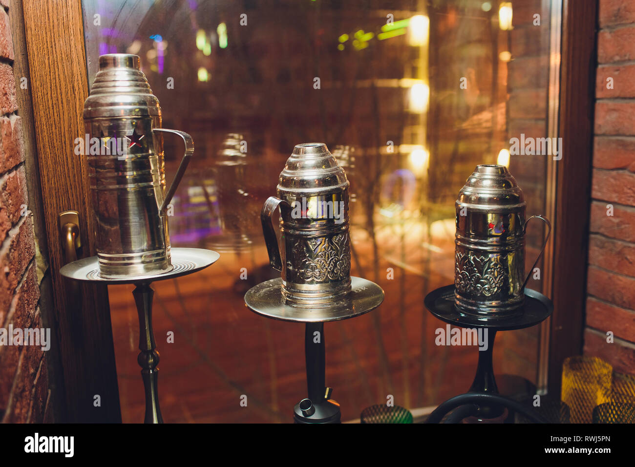 many hookah caps in a hookah cafe Stock Photo - Alamy
