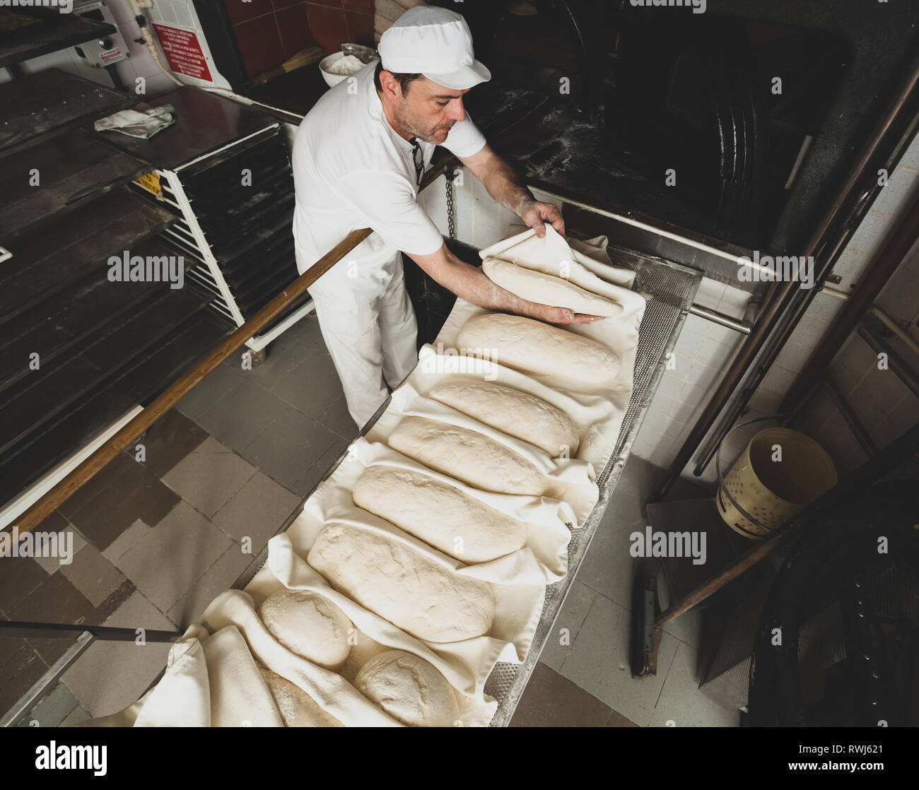 Daily production of bread baked with wood oven with traditional method ...
