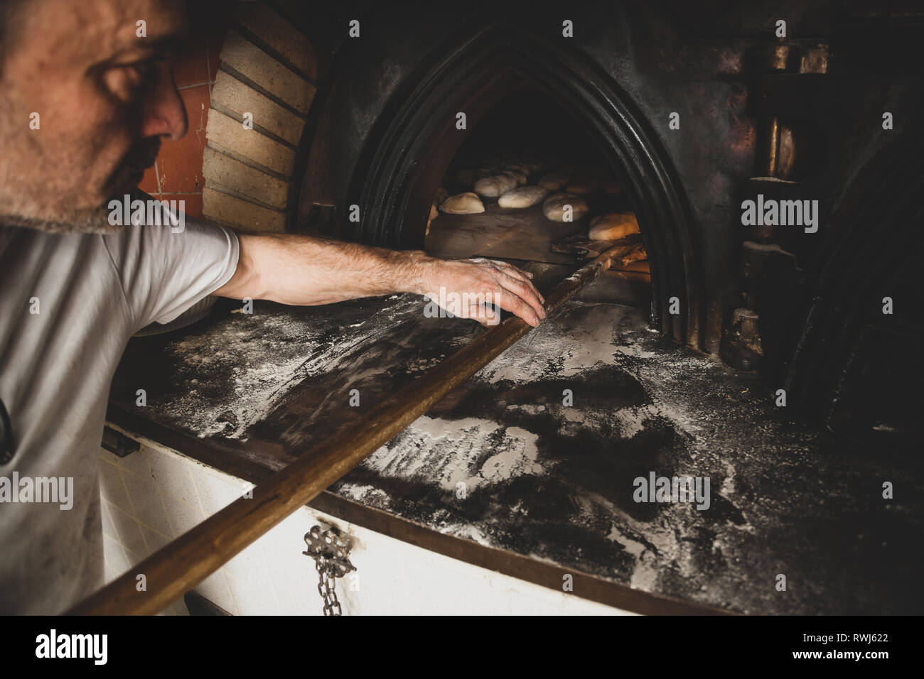 Daily production of bread baked with wood oven with traditional method ...