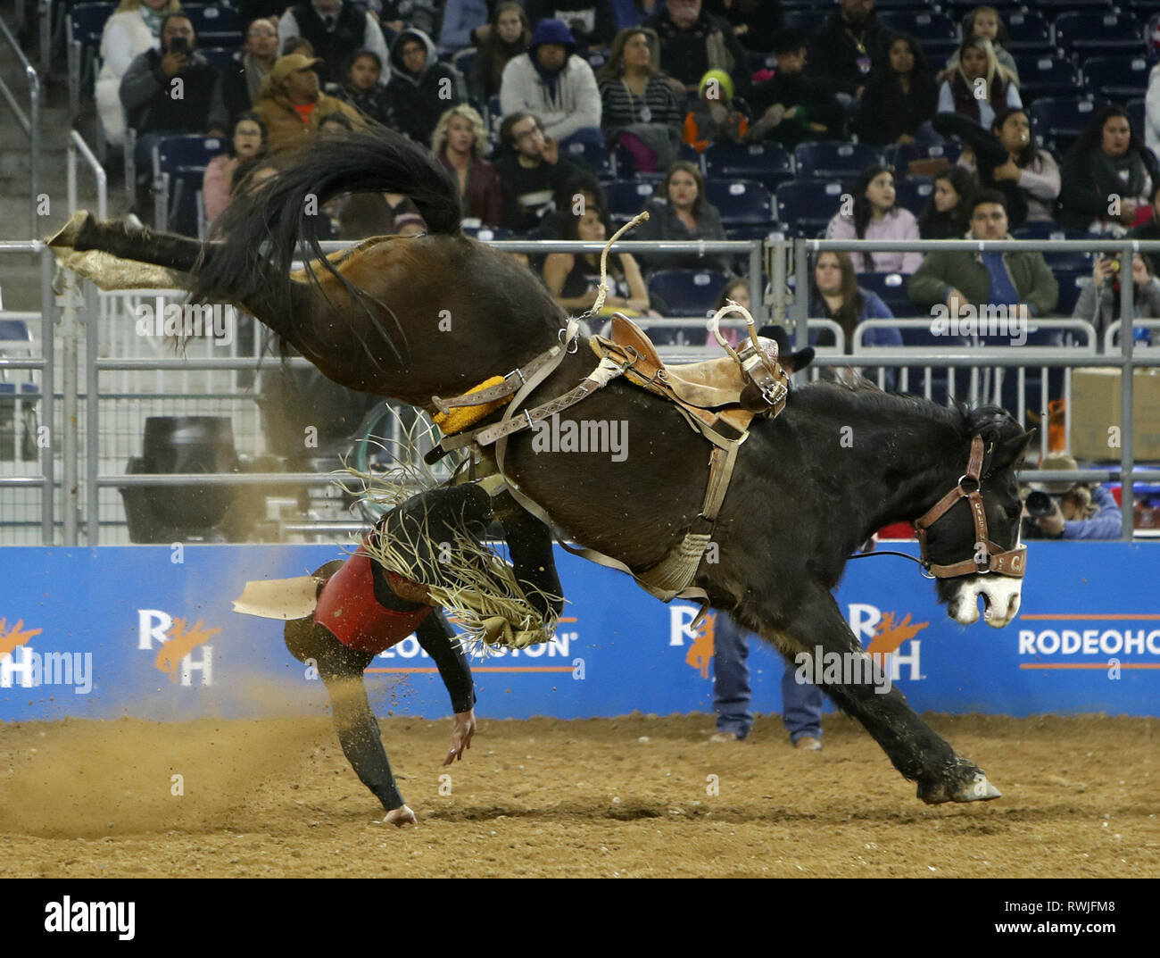 Beijing, USA. 5th Mar, 2019. A rider falls from a horse during the ...
