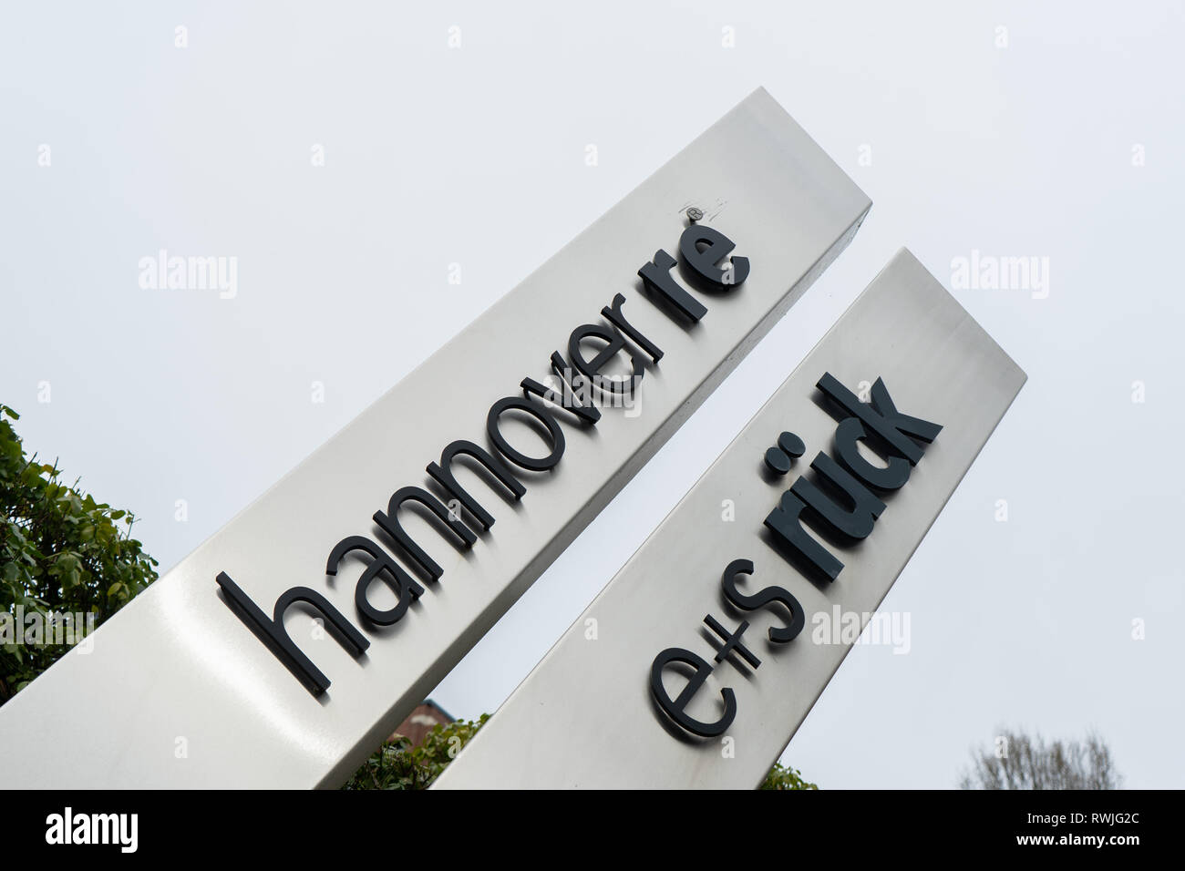 Hannover, Germany. 18th Feb, 2019. A sign of Hannover Re stands in ...