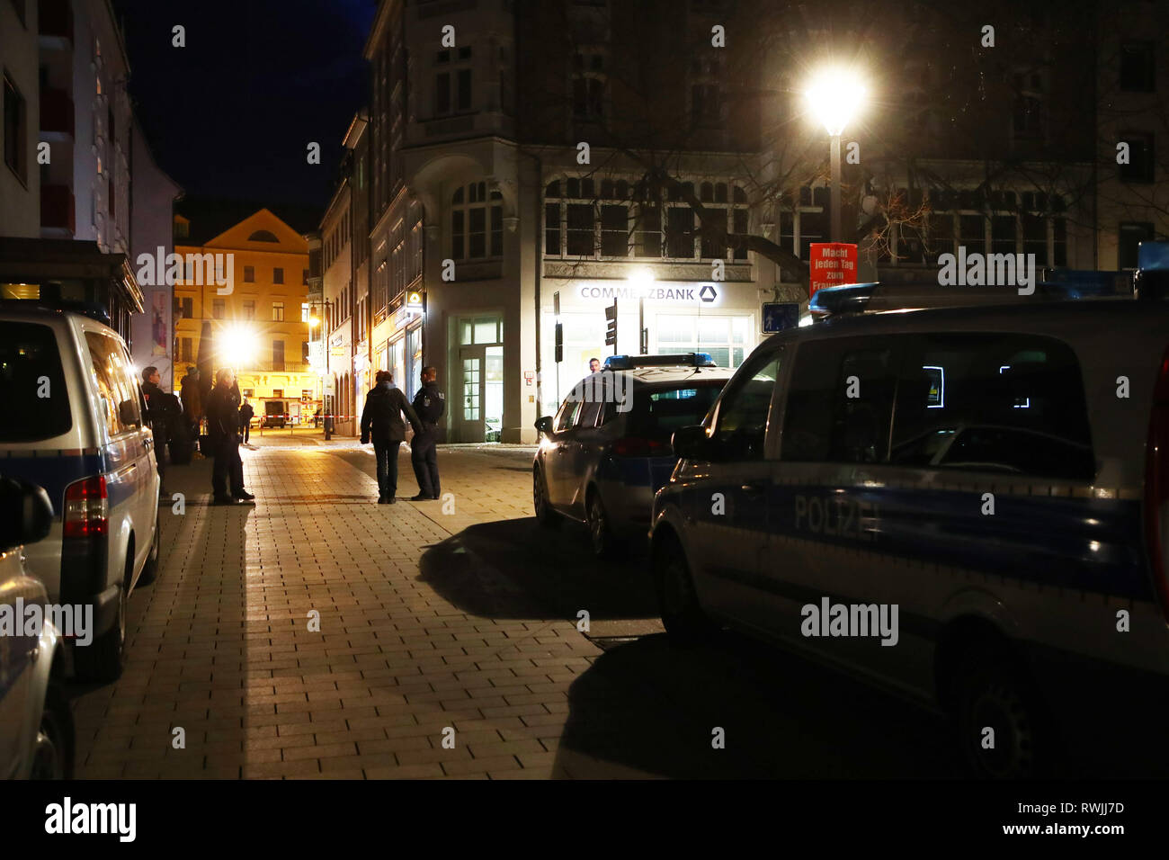 Gera, Germany. 07th Mar, 2019. Police vehicles and police officers are ...