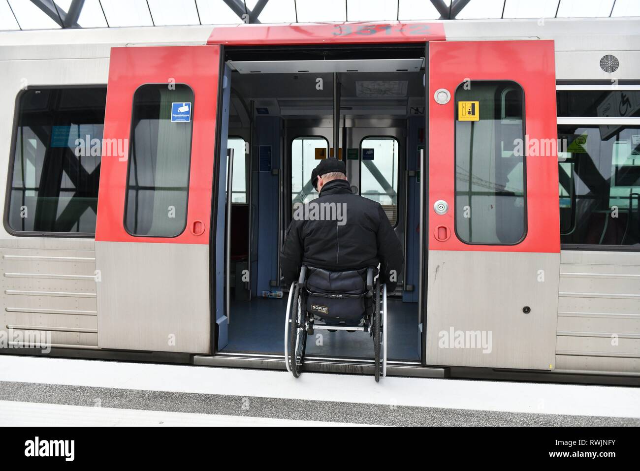 Wheelchair user subway train hi-res stock photography and images - Alamy