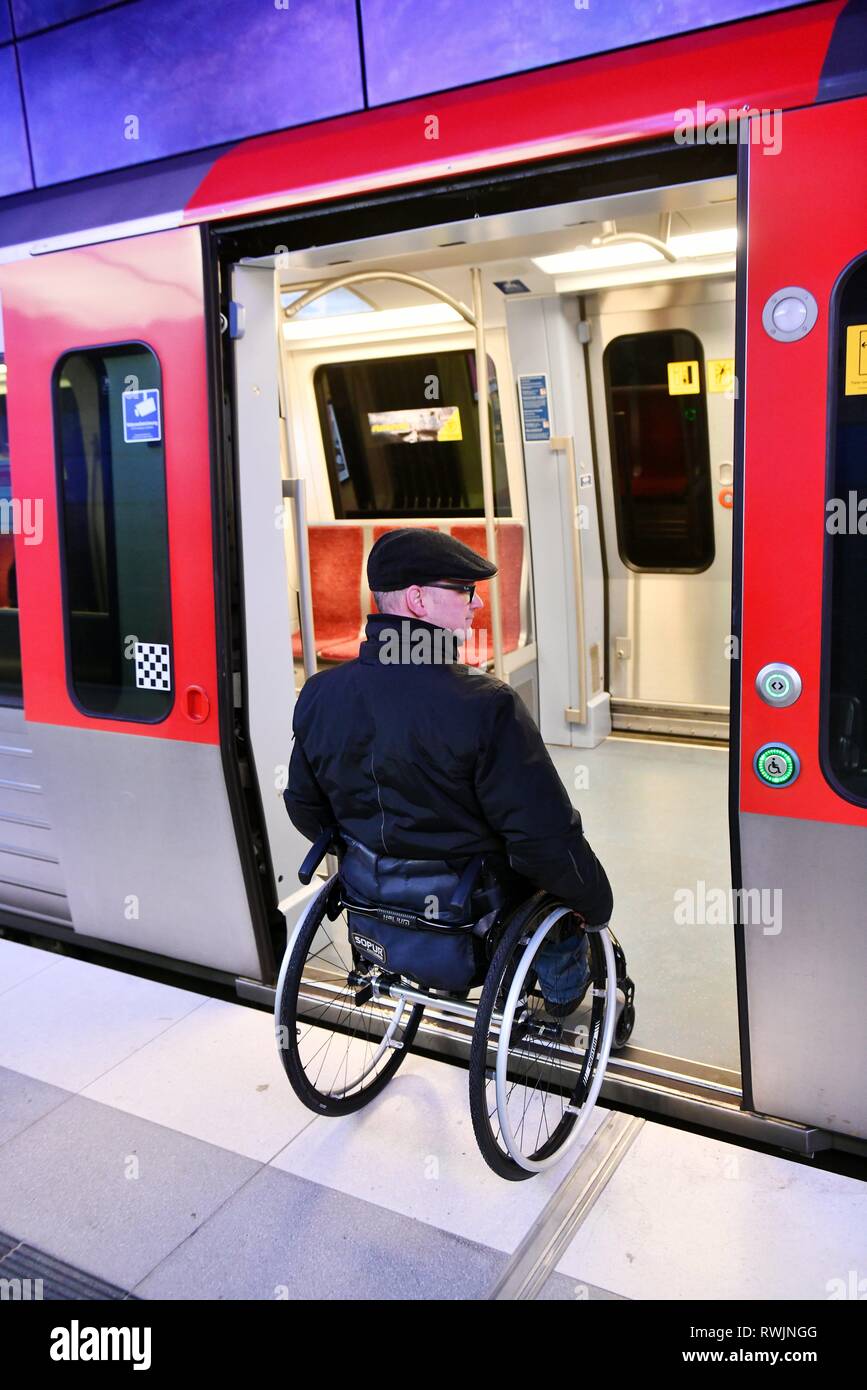 Wheelchair user subway train hi-res stock photography and images - Alamy