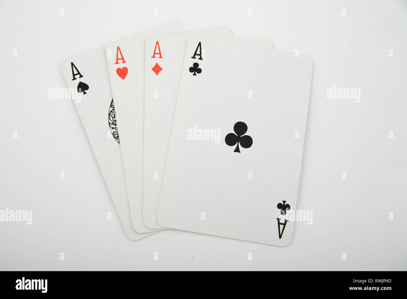 four aces - playing cards on light background Stock Photo - Alamy