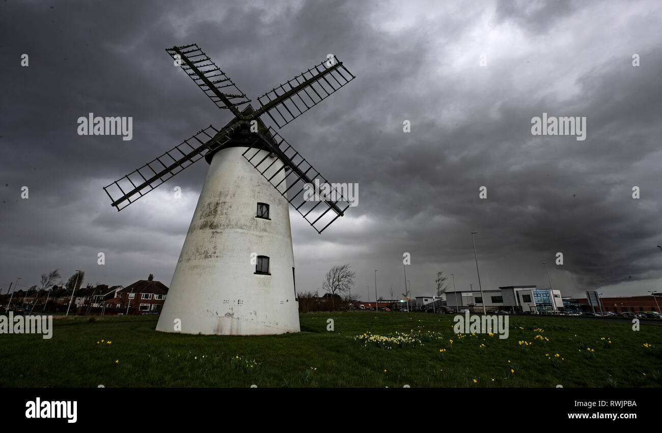 Dark clouds form over the Little Marton Windmill in Blackpool Stock ...