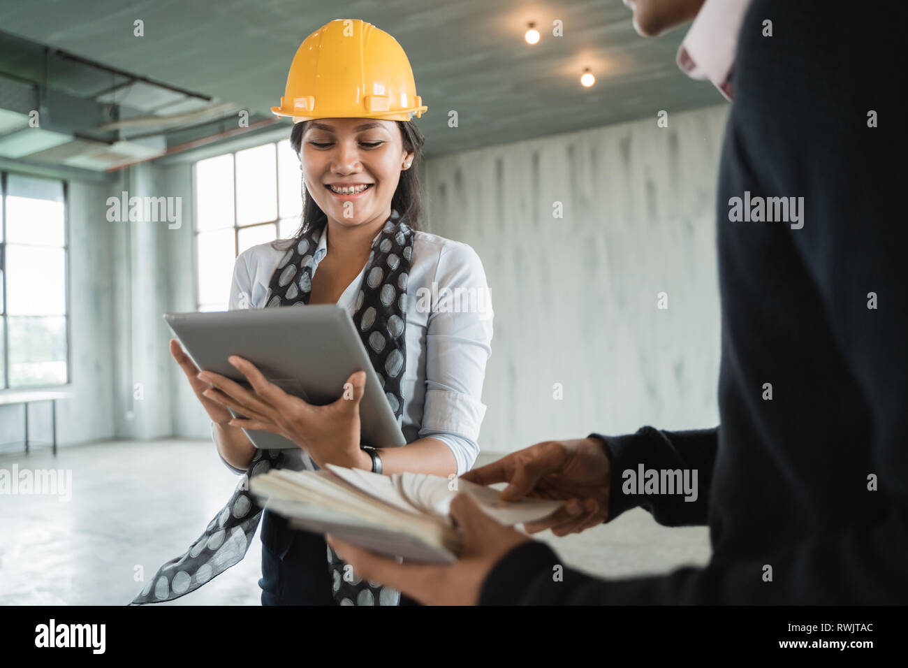 Businessman asian woman look tablet hi-res stock photography and images ...