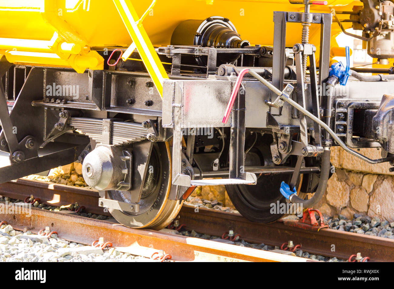 Ballast train. A large cargo yellow train at the station Stock Photo ...