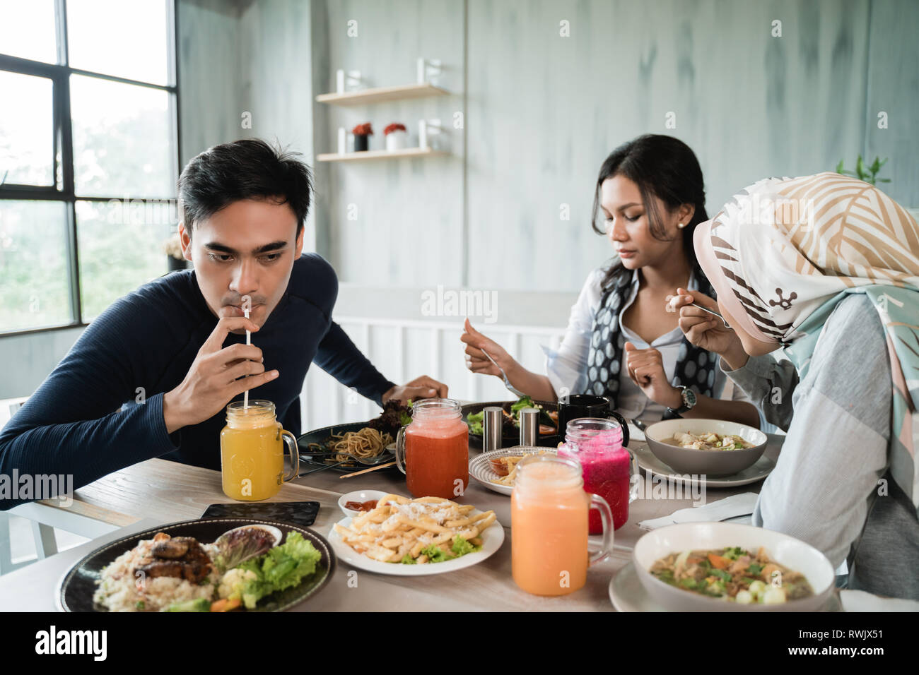 happy asian friends having lunch together Stock Photo - Alamy
