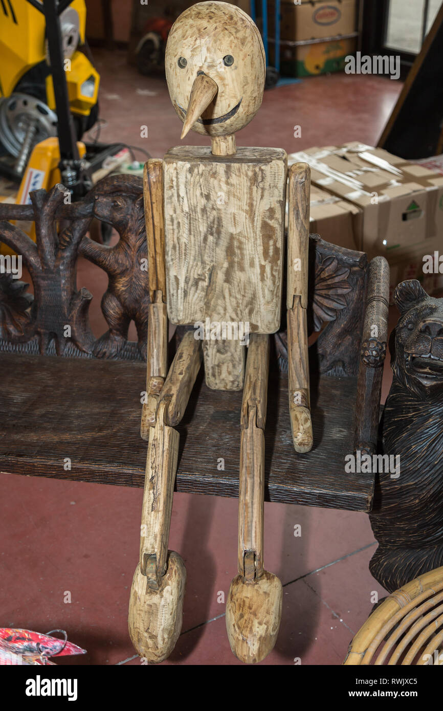 Wooden Articulated Puppet Sitting on a Bench Stock Photo - Alamy