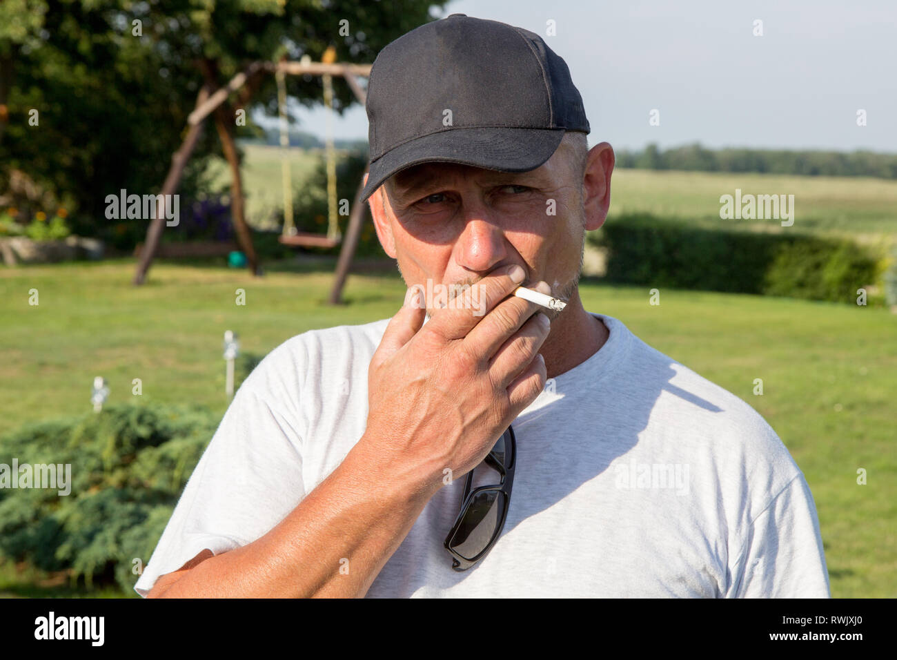 mam smoking cigarette Stock Photo - Alamy