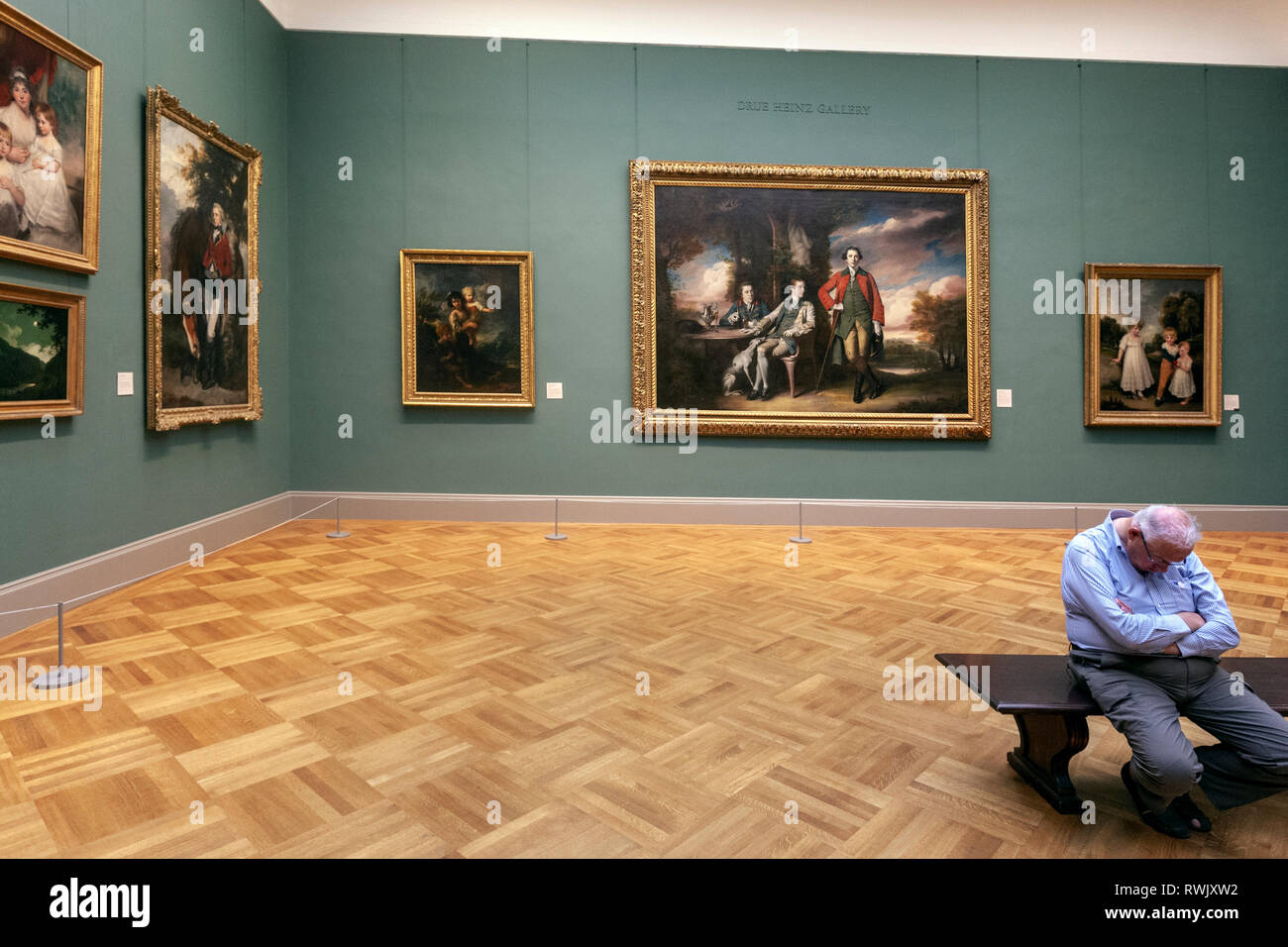 Visitor sleeping in a bench in the Drub Heinz gallery, The Metropolitan ...