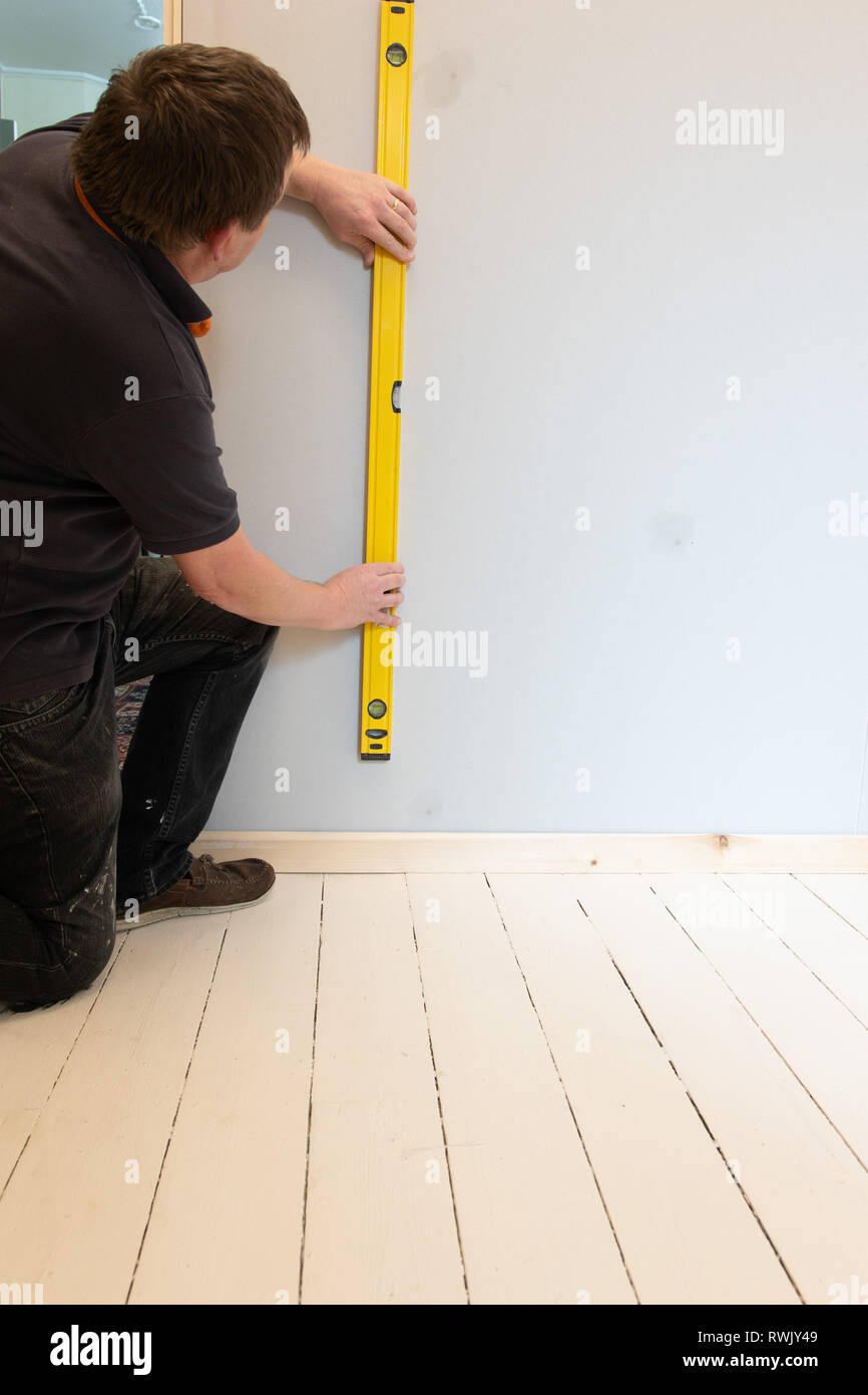 Skirting board measuring hi-res stock photography and images - Alamy