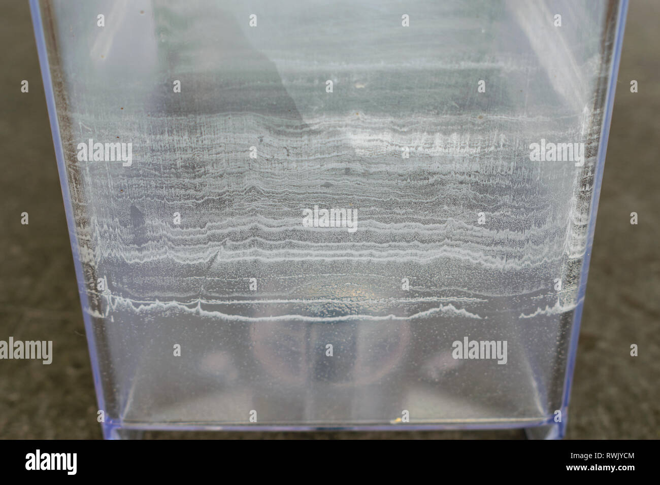 Limescale on plastic water tank from coffee machine Stock Photo - Alamy