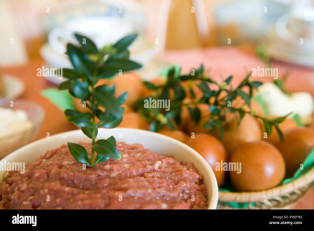 steak tatar - minced meat with eggs, onion, salt and pepper on easter ...