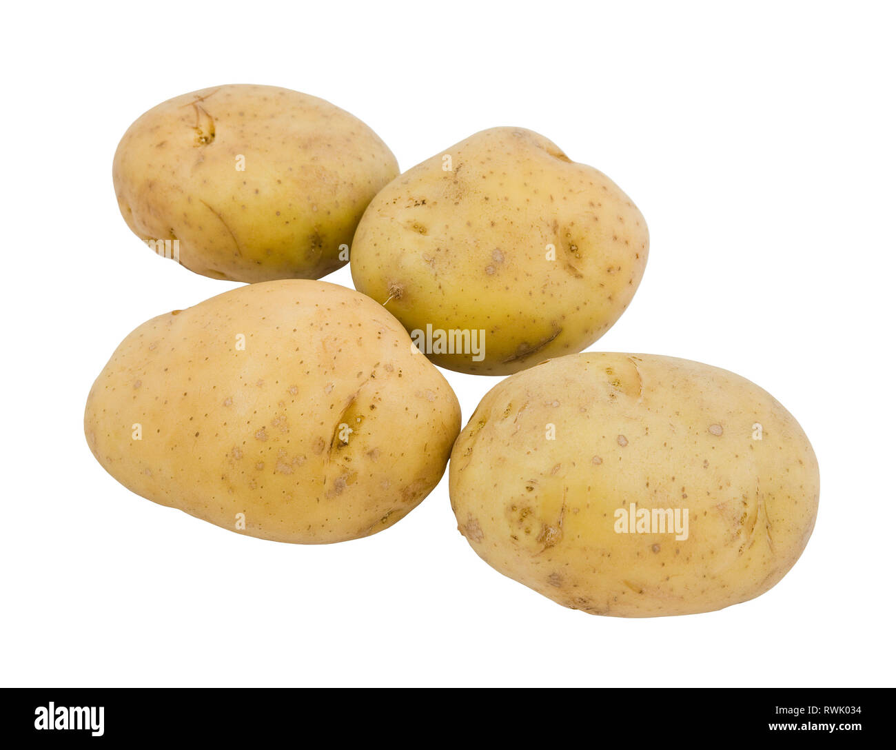 four young potatoes isolated on perfectly white background Stock Photo ...