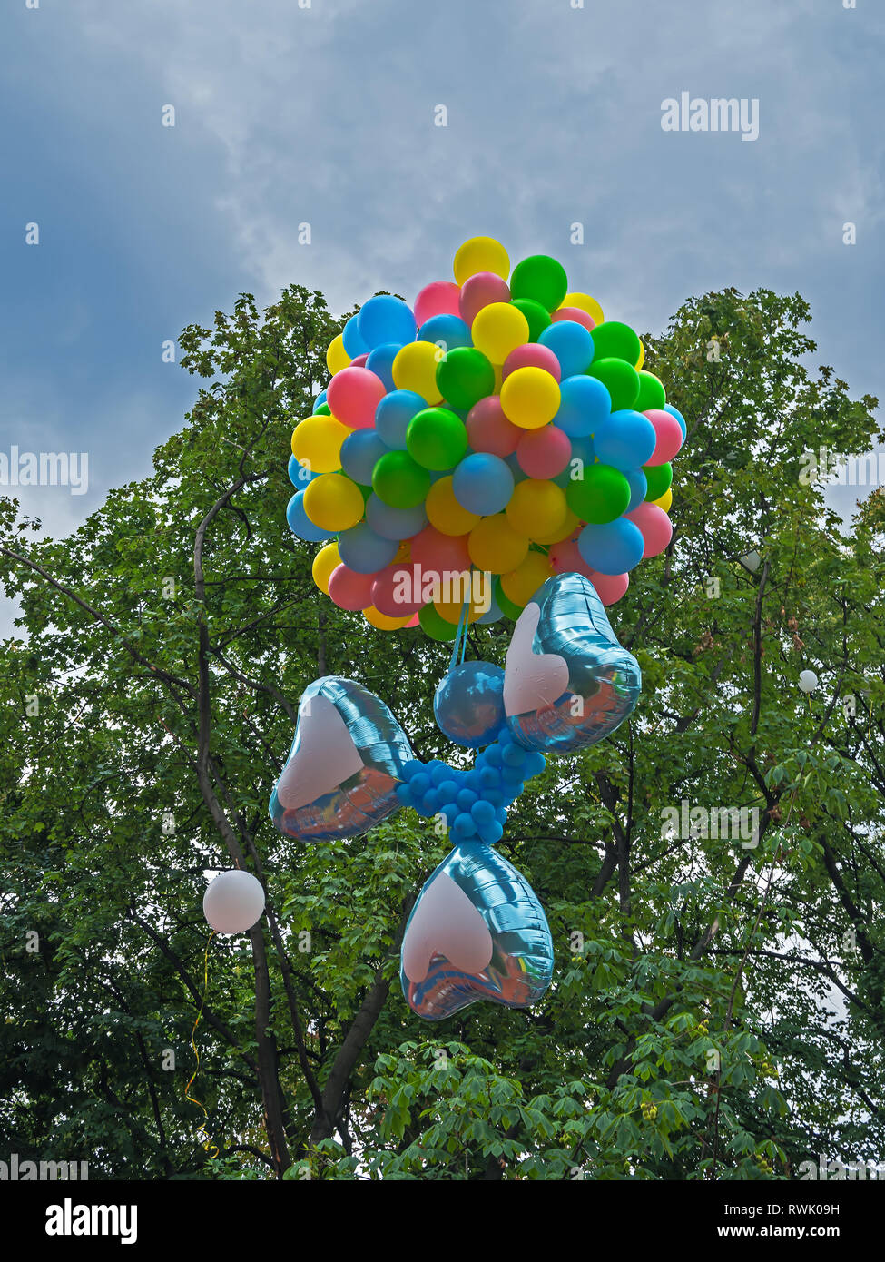 Festive balloons flying in sky hi-res stock photography and images - Alamy