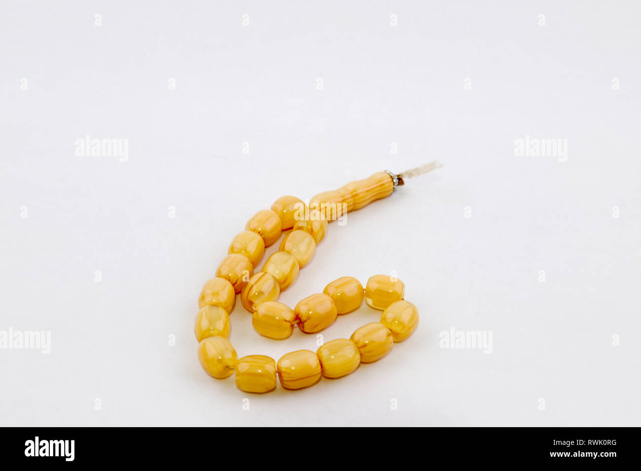 Colorful rosary and prayer Stock Photo - Alamy