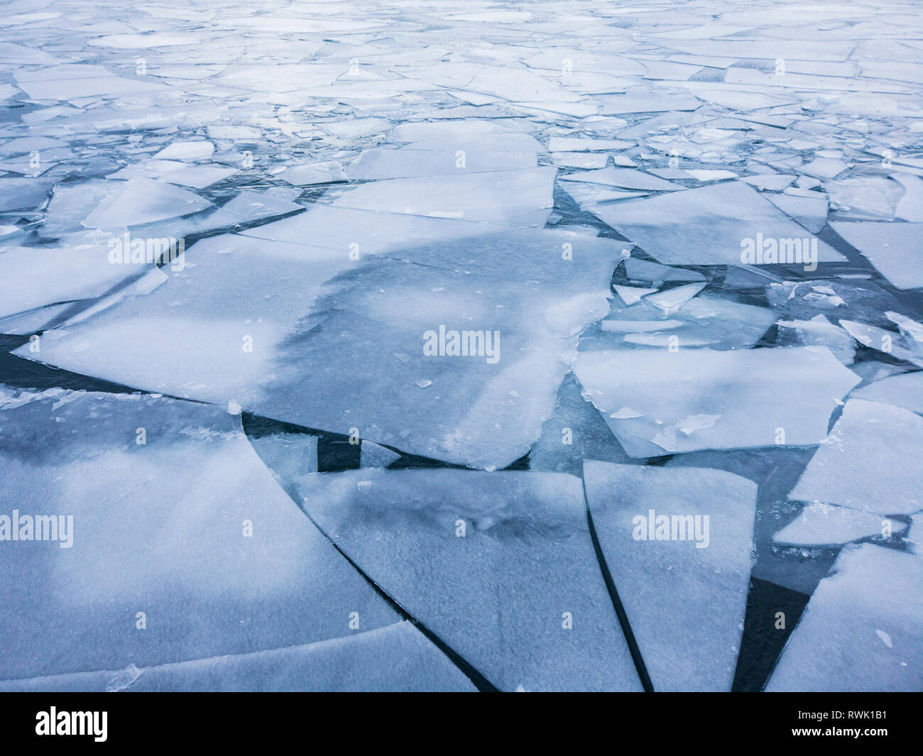 Cracked ice on the surface of the ocean. Global warnimg concept Stock ...