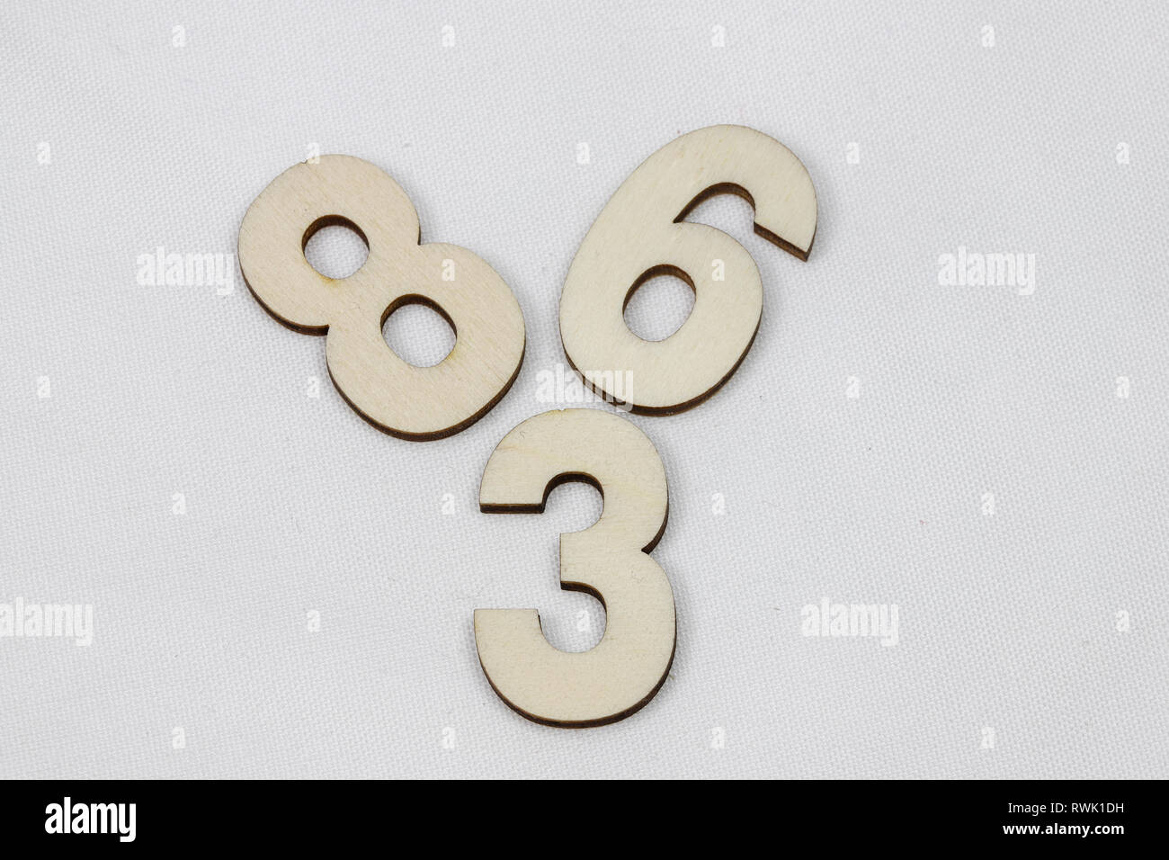 Wooden number on the white background Stock Photo - Alamy