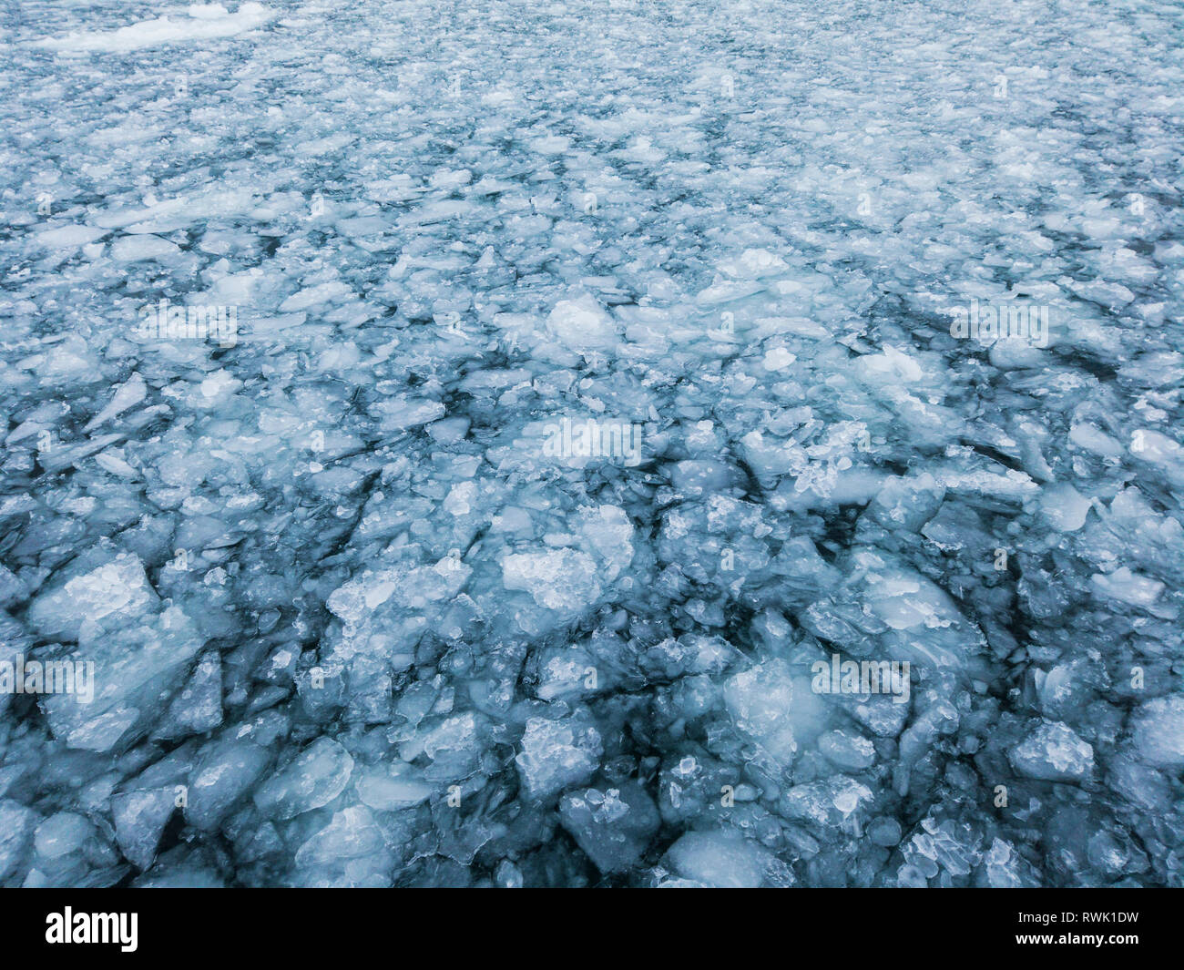 Cracked ice on the surface of the ocean. Global warnimg concept Stock ...