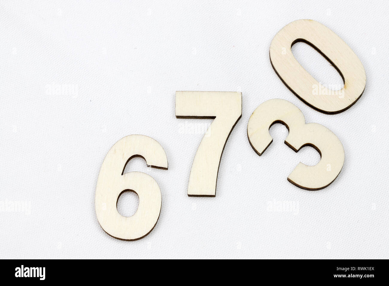 Wooden number on the white background Stock Photo - Alamy