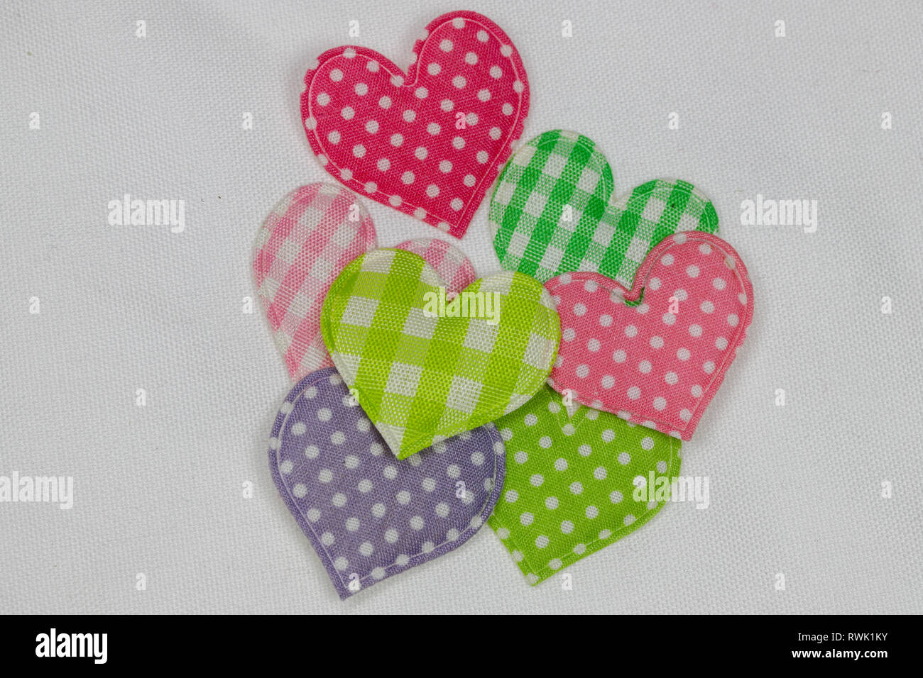 Colorful fabric hearts Stock Photo - Alamy
