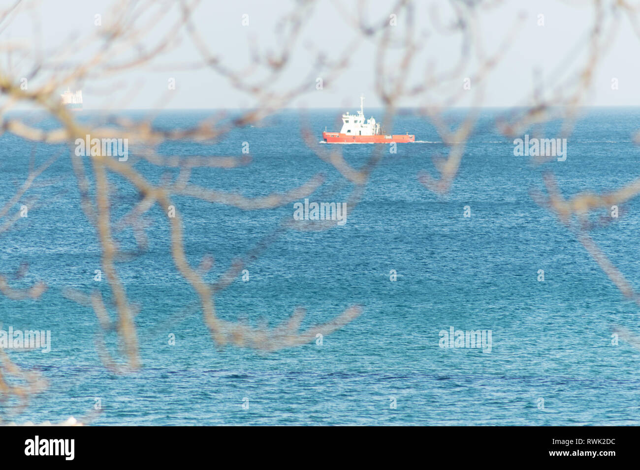 beautiful view of the sea, ocean and merchant ship. A beautiful clear ...
