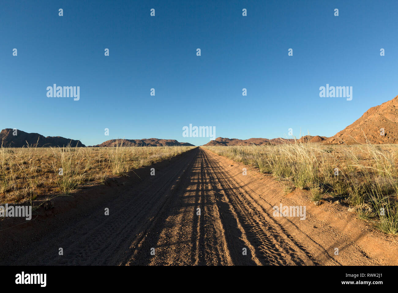 A sandy road in the Namib desert Stock Photo - Alamy