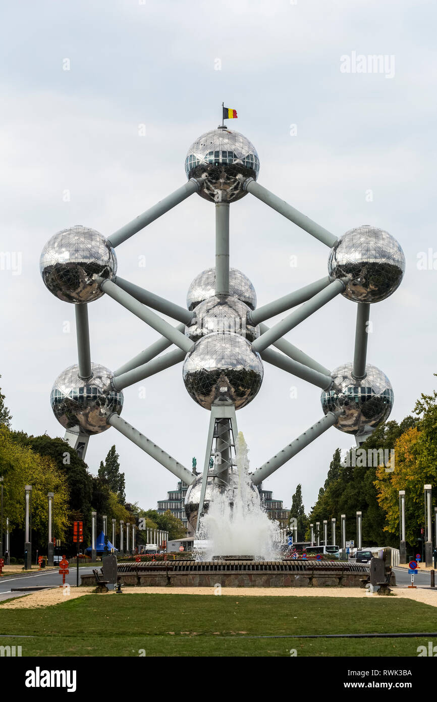 Large stainless steel art structure in the shape of an atom with blue ...