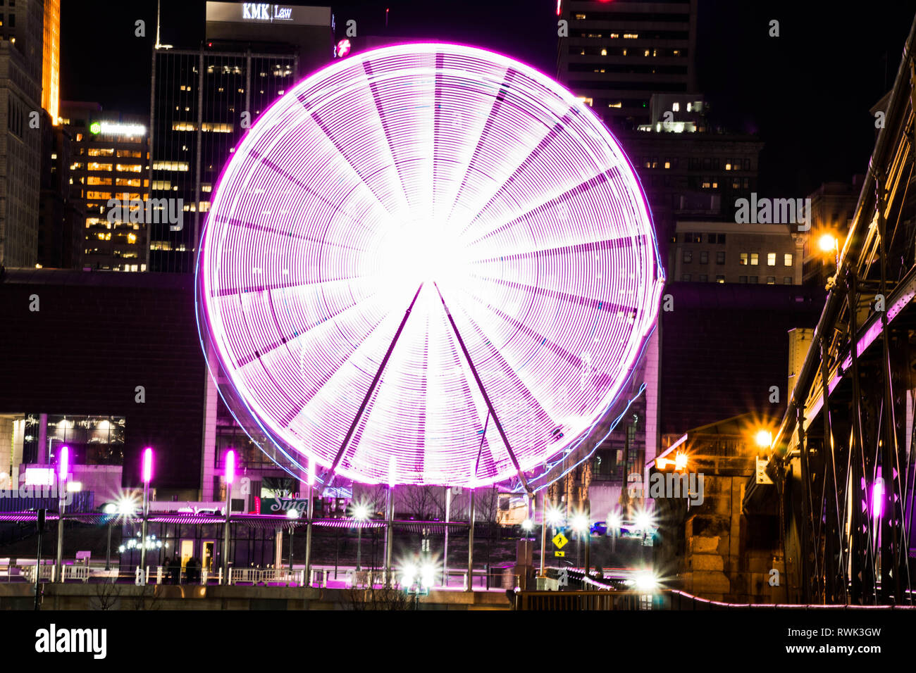 The SkyStar Wheel in downtown Cincinnati, lit up and beaming Stock ...