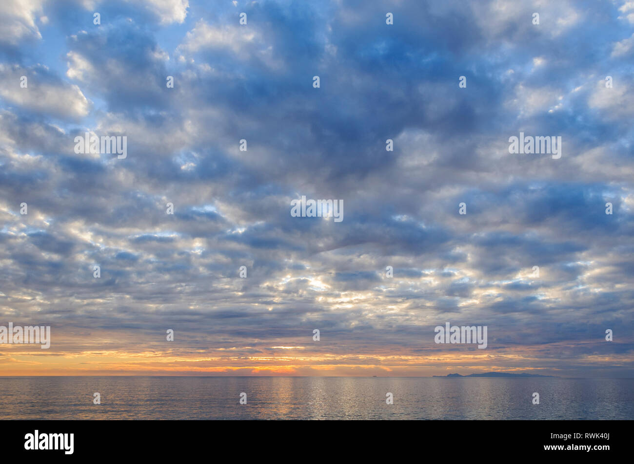 Cumulus clouds over the Pacific Ocean at sunset near Malibu on the ...