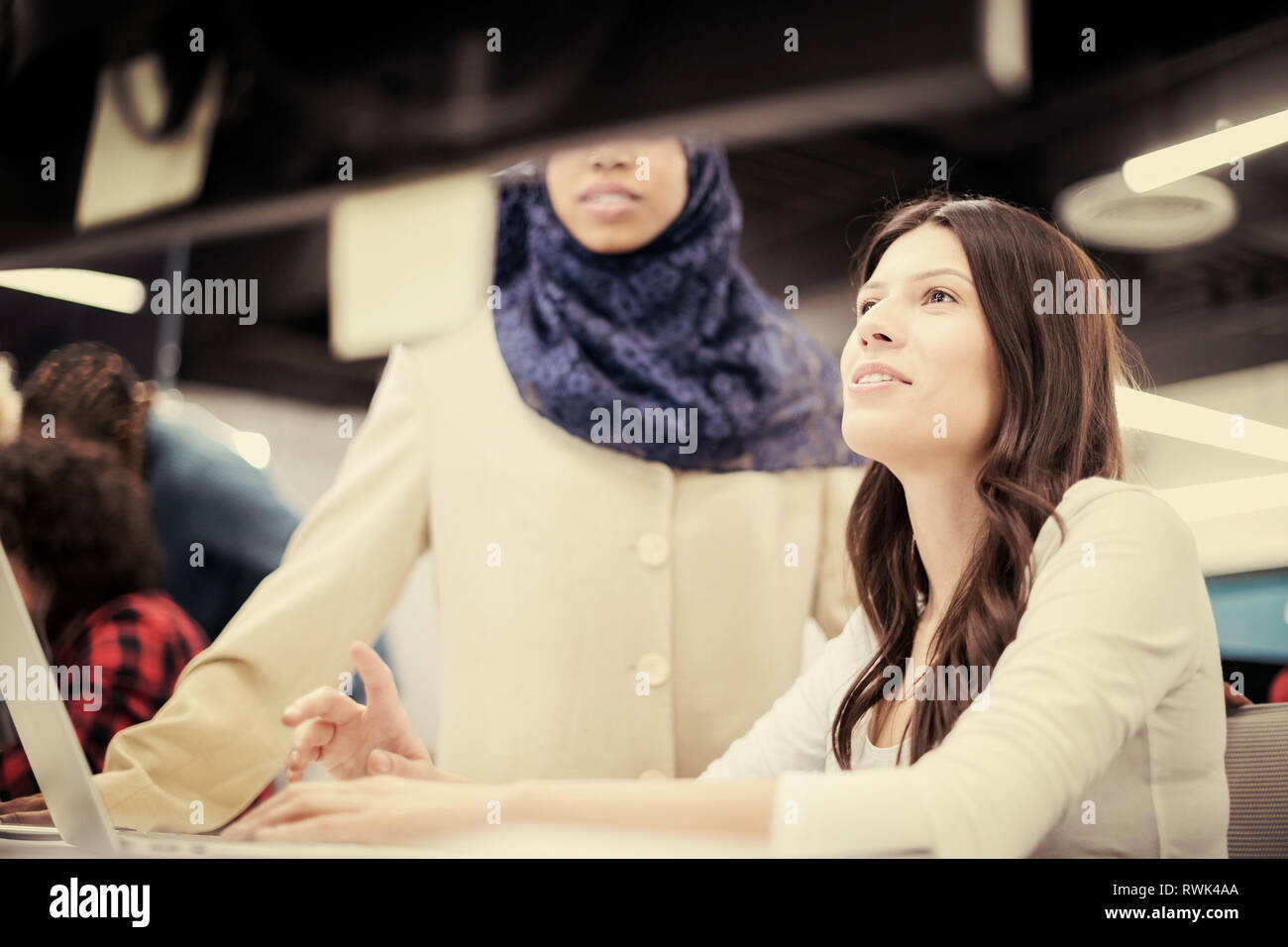 young multiethnics business team of software developers working ...