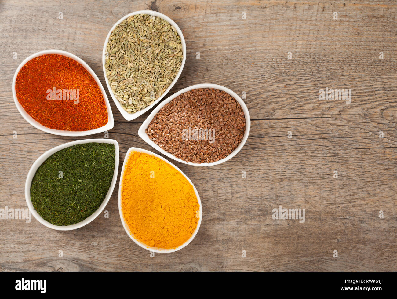 Indian spices and herbs in spice bowls hi-res stock photography and ...