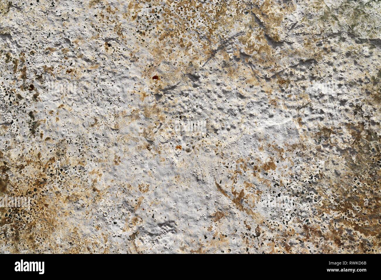 Close up detailed surface of granite and concrete mixed walls in high ...