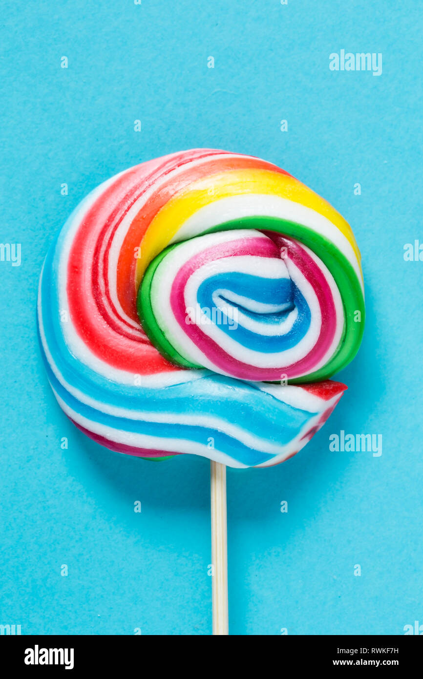 Rainbow swirl lollipop hi-res stock photography and images - Alamy
