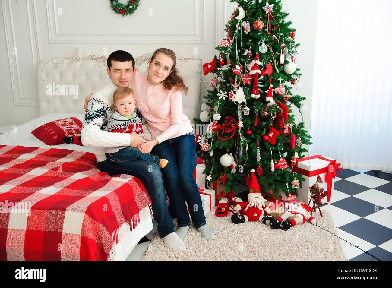 Happy family celebrating new year's eve together Stock Photo - Alamy