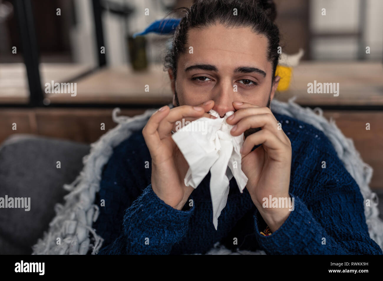 Portrait of a sad sick young man Stock Photo - Alamy