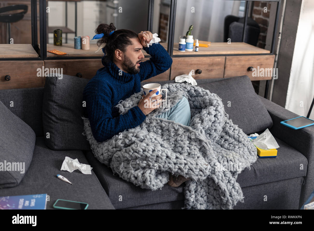 Feeling high temperature young hi-res stock photography and images - Alamy