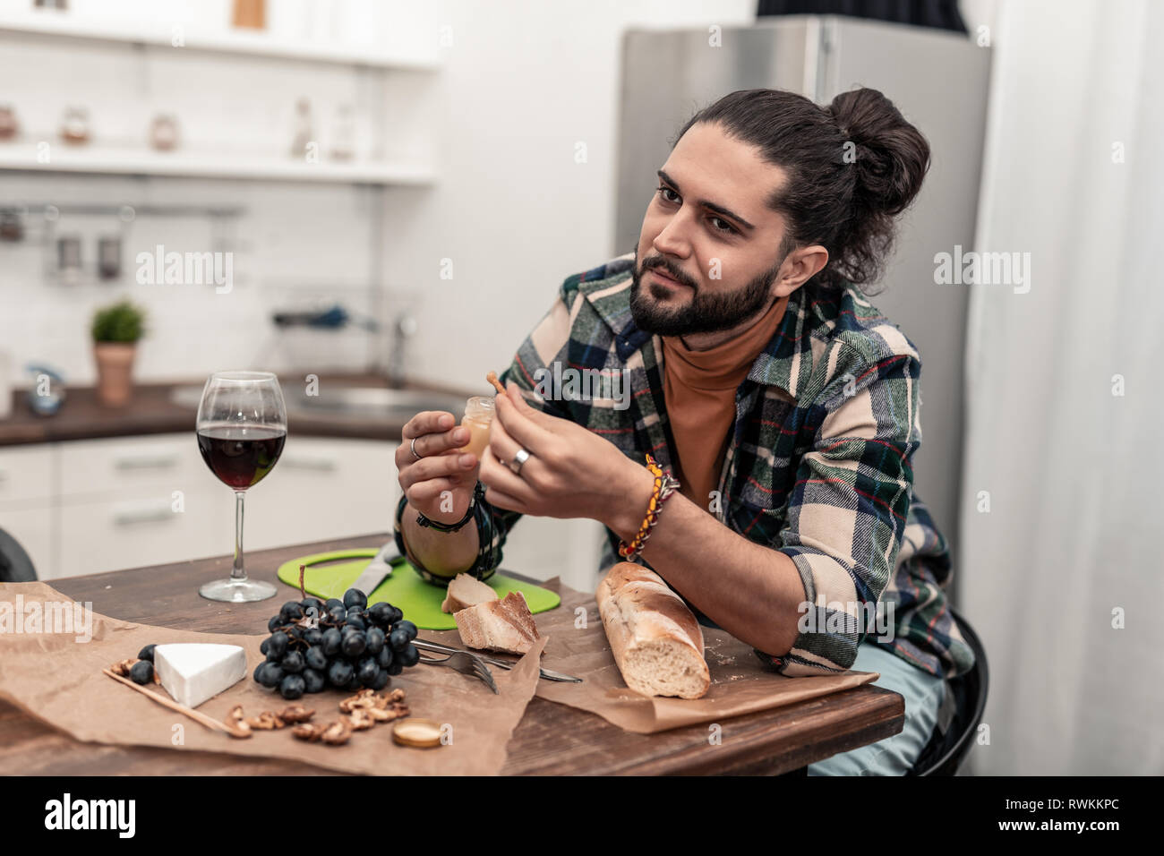 Positive nice man having a great dinner Stock Photo - Alamy