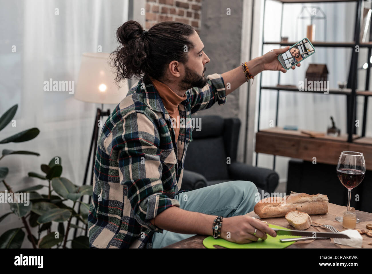 Young man making sandwiches hi-res stock photography and images - Alamy