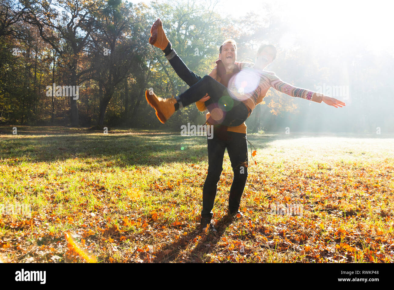 Man carrying woman hi-res stock photography and images - Alamy