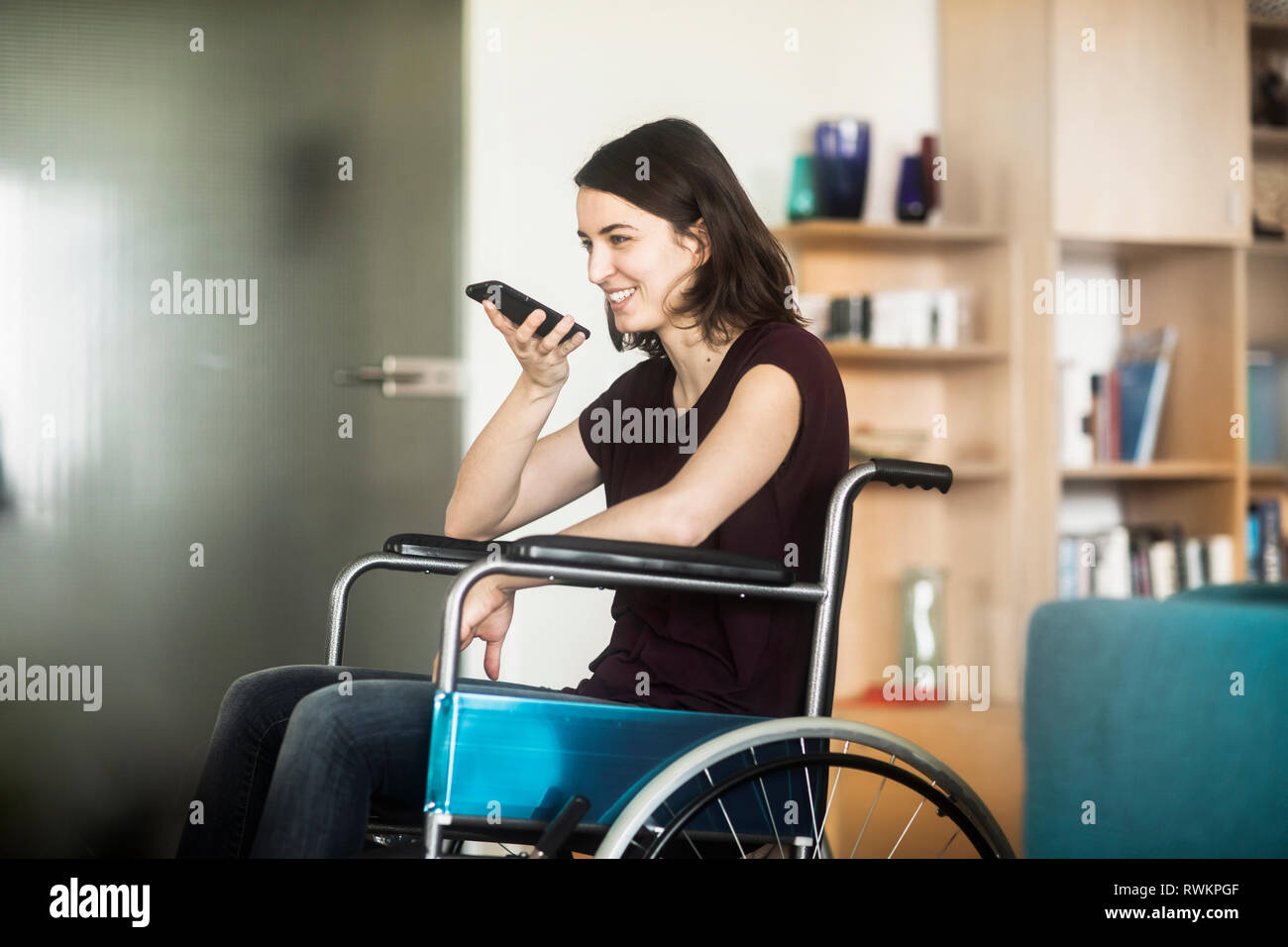 Woman in wheelchair talking on hi-res stock photography and images - Alamy