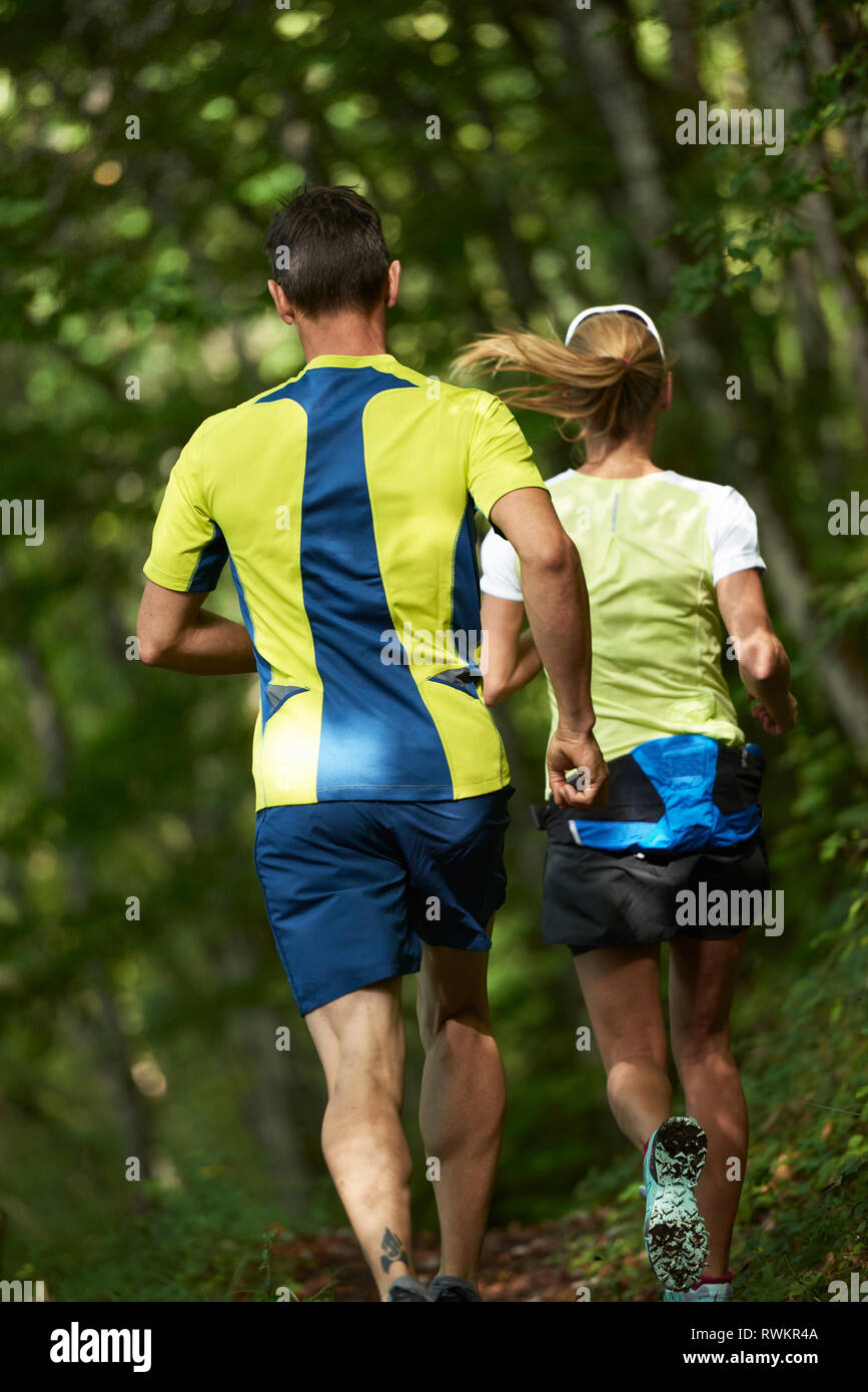Three joggers hi-res stock photography and images - Alamy
