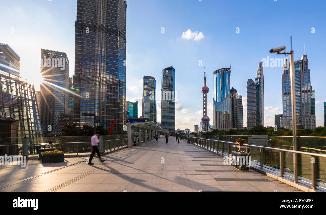 Pudong skyline with Oriental Pearl Tower from elevated walkway ...